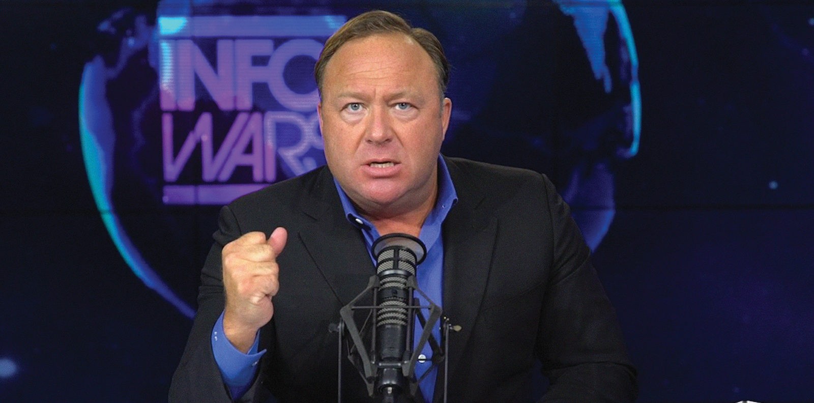 Spotify rimuove podcast del complottista Alex Jones: era già bannato da ...